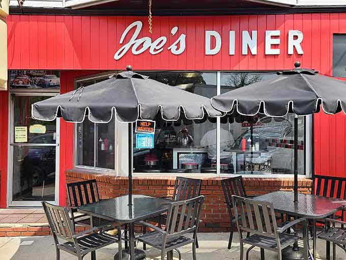 Those sidewalk umbrellas promise the kind of leisurely dining experience that makes you forget your smartphone exists.