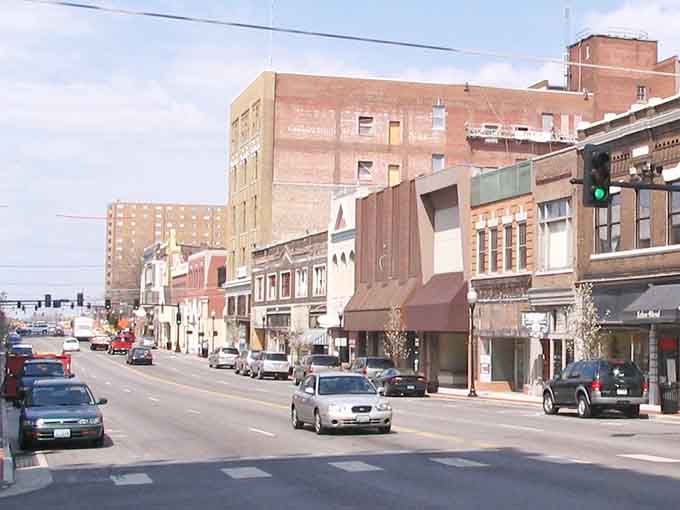 The mix of old brick and new construction shows a city that honors its past while building its future.