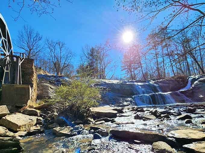 Winter transforms this waterfall into a sparkling ice sculpture while the water keeps flowing through frozen beauty.