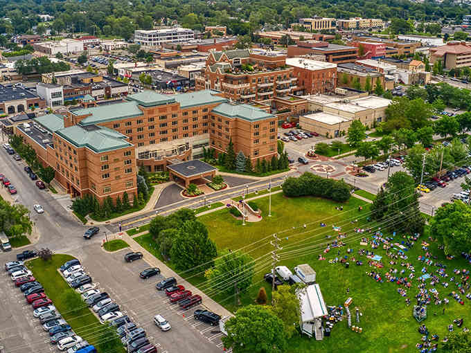 Green lawns and brick buildings create a campus-like setting that feels both welcoming and impressively organized.