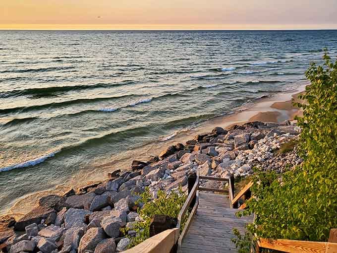 Your personal stairway to lakeside serenity, where the water glows like liquid gold in the fading light.