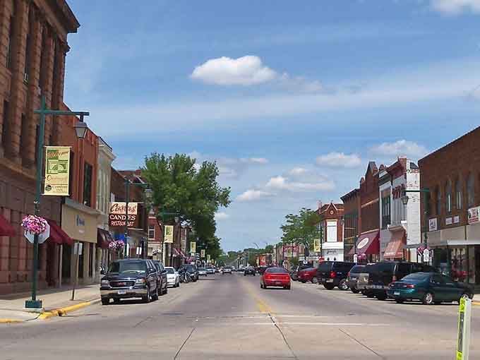 Tree-lined streets stretch toward the horizon where local shops wait to welcome you like an old friend.