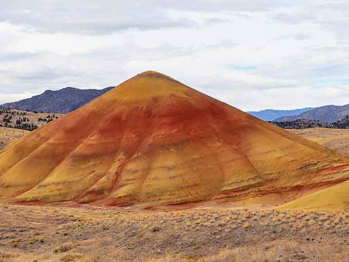 This crimson-striped hill rises from the desert like a perfectly layered Neapolitan dessert without the vanilla.