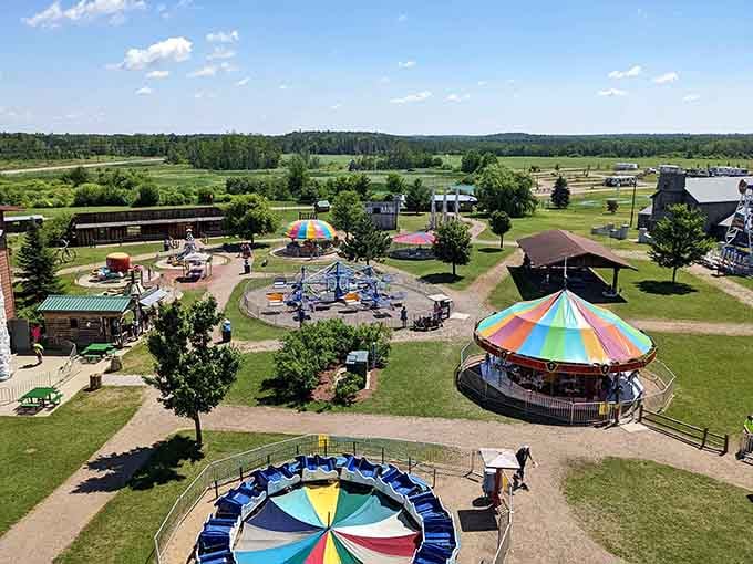 This aerial view reveals a wonderland of vintage rides where carousel dreams and childhood memories come alive.