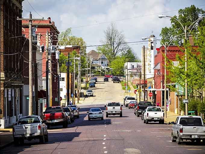 Spring greenery frames these timeless streets where parking is easy and stress is optional.