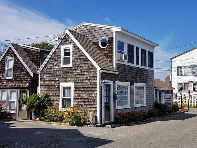 Weathered shingles and porthole windows give this coastal cottage the kind of character money simply can't buy.
