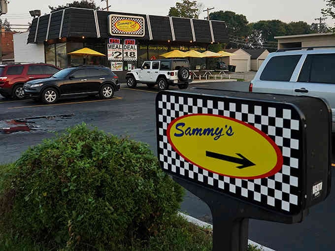 That checkered racing flag sign points you toward victory, and victory tastes like Chicago-style perfection on a bun.