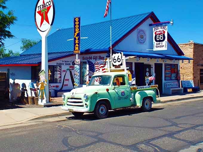 That vintage turquoise truck and classic Texaco sign capture the golden age of American road trips perfectly.