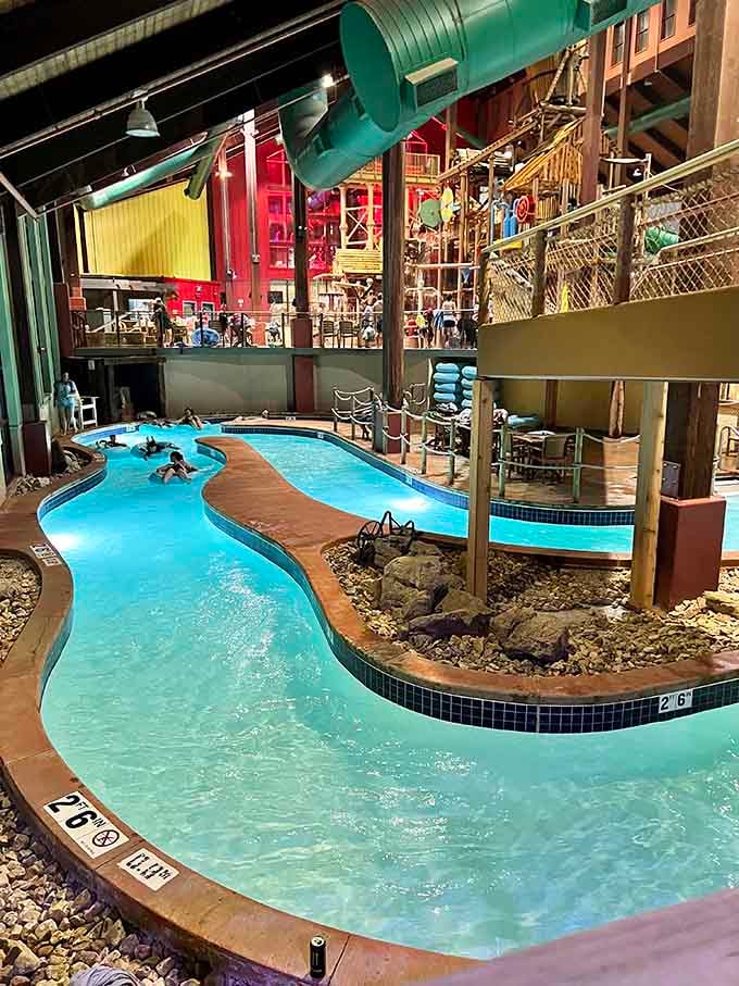 Inside this tropical paradise, the lazy river winds past rock formations like a Caribbean vacation without the airfare.