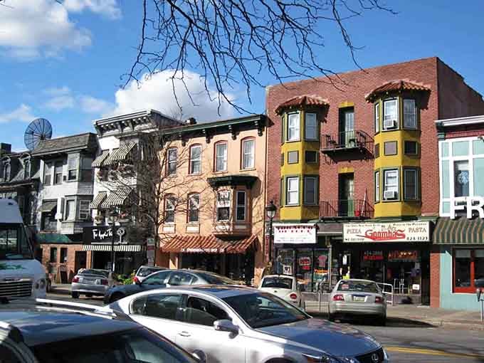 Every building tells a story here, and none of them involve cookie-cutter chain store designs.