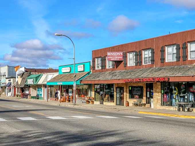 Sunny skies illuminate a downtown where every storefront tells a story and every shop owner remembers your visit.
