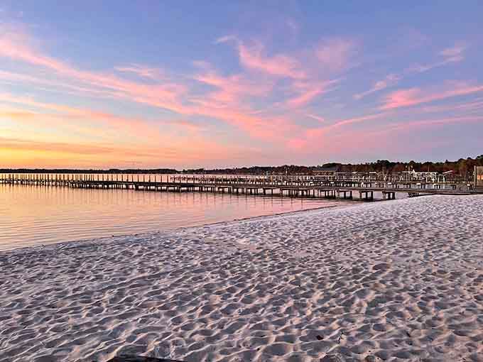 Sunset paints the sky in cotton-candy hues while gentle waves kiss the shore in perfect rhythm.