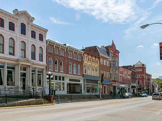 These colorful storefronts lined up like old friends remind you when downtowns were the heart of everything.