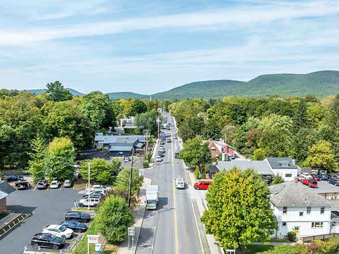 Mountains frame this main street like nature's own picture frame, proving the best views don't require a museum admission.