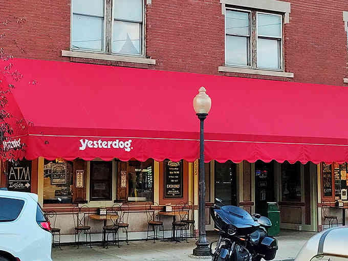 The bright red awning welcomes you like an old friend, inviting you to discover what makes Yesterdog a beloved tradition.