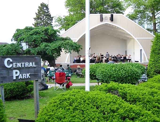 Central Park's bandshell hosts summer concerts where neighbors actually know each other's names, imagine that.