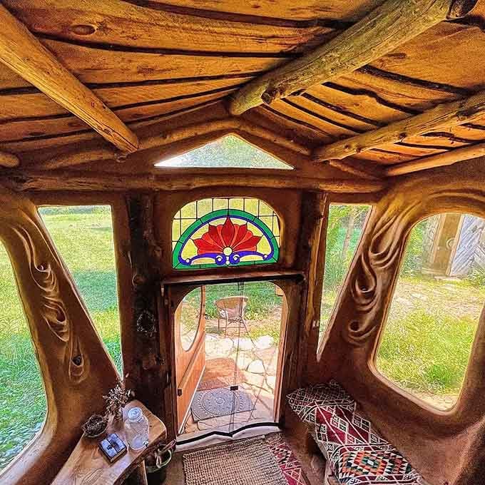 Looking out through these organic windows feels like viewing the world through a kaleidoscope of natural beauty.
