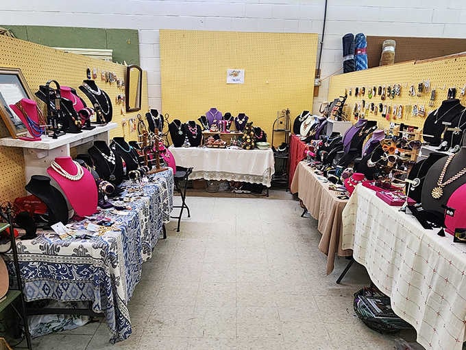 Jewelry displays gleam against sunny yellow walls, offering sparkle from decades past at every turn and table.