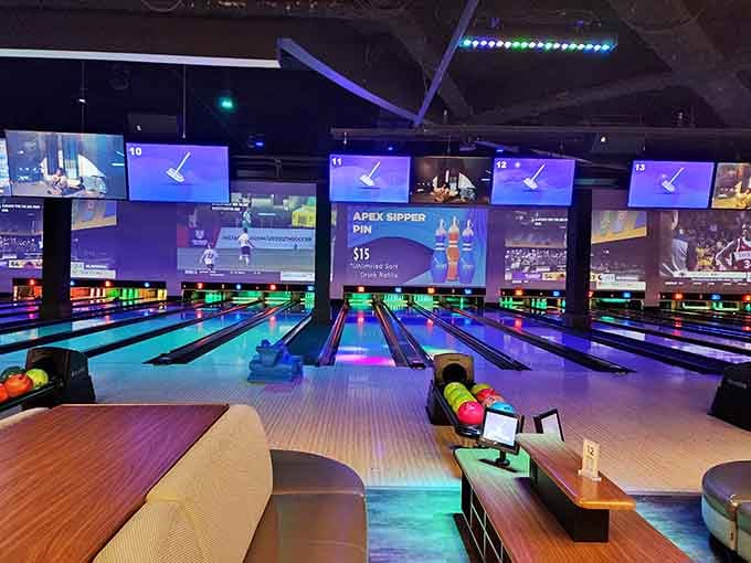 Bowling lanes bathed in neon glory prove that knocking down pins doesn't have to feel like your grandfather's hobby.