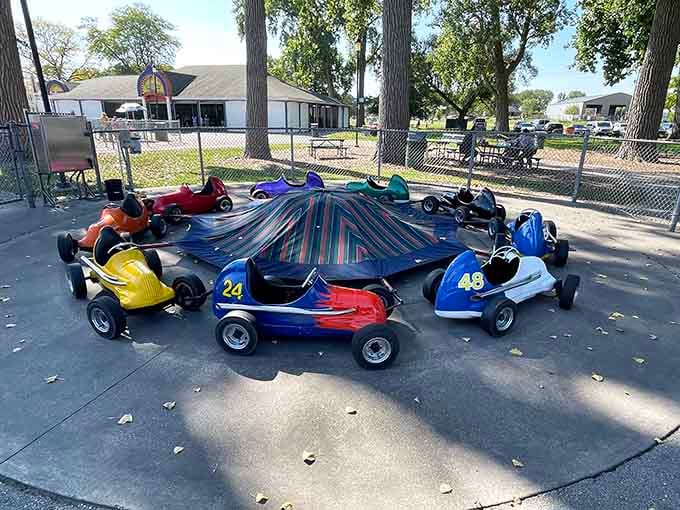 These colorful miniature racers spin endlessly, creating dizzy memories that last far longer than the ride itself.