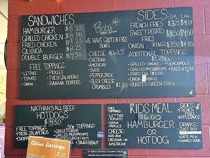 The chalkboard menu keeps things simple: burgers, sandwiches, hot dogs, and sides that actually matter.