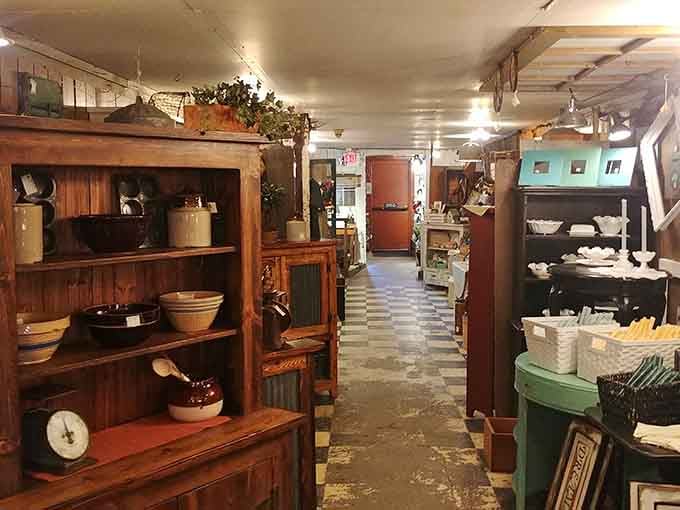 Wooden shelves stretch endlessly through the barn's interior, each corner hiding another era's forgotten treasures waiting patiently.
