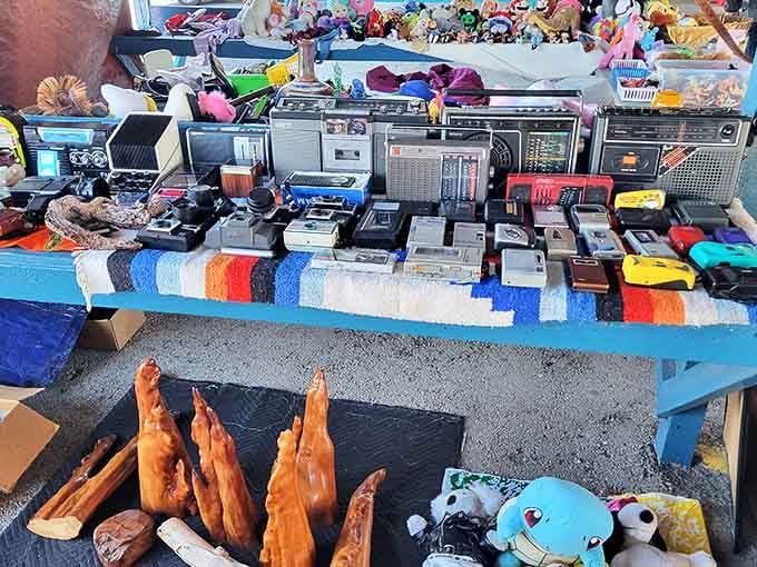 Nothing says "I've found my people" quite like a table full of vintage boomboxes waiting to blast your favorite 80s jams.