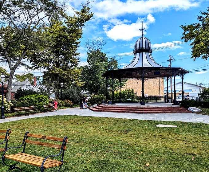 The gazebo where locals gather, proving that some things never go out of style, unlike your cargo shorts.