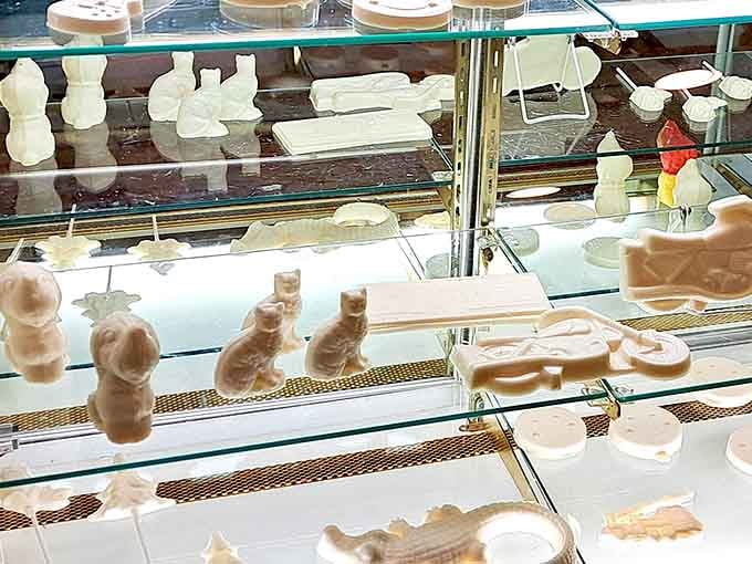 Custom-molded chocolates taking shape on the production line, because mass-produced candy bars are so last century.
