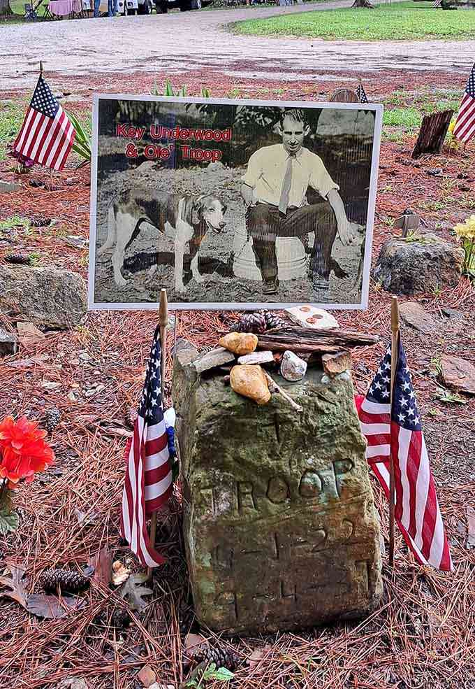 Troop was the first to rest here, his vintage photo and memorial proving some friendships deserve monuments that last forever.