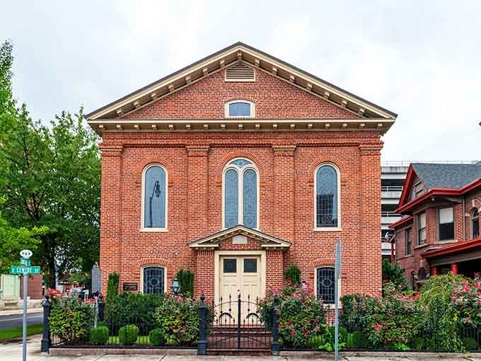 This red-brick temple stands proud with arched windows that catch light like stained glass in a Spielberg film.