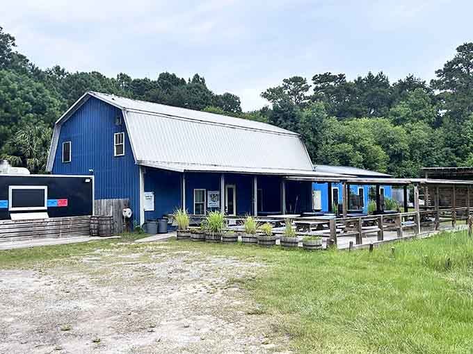 This blue barn distillery looks like it wandered off a postcard and decided to start making exceptional rum instead of going back.