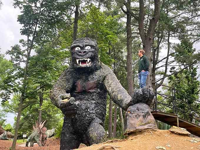 King Kong clutching a damsel proves this place never met a prehistoric creature it didn't want to include.