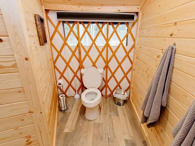 Even the bathroom gets the lattice treatment, proving that glamping means never compromising on style or function.