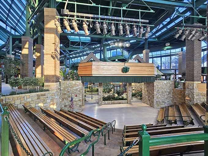 Natural light pours through that glass ceiling like liquid sunshine, proving Minnesota winters haven't completely broken our spirits yet.