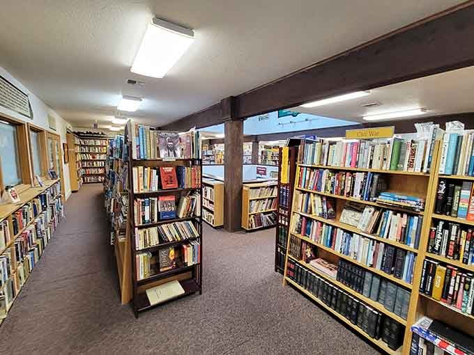 Rows of carefully organized shelves create a maze of literary possibilities waiting to be explored.