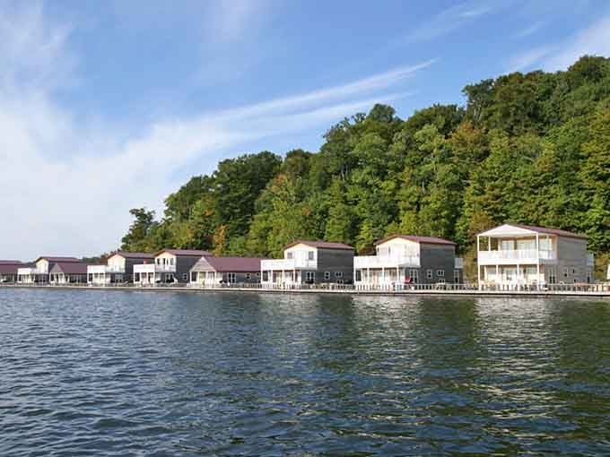 Floating cabins line the water like a charming lakeside neighborhood where your morning commute involves jumping straight into swimming.