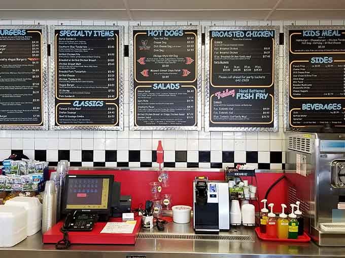 The menu boards promise everything your hungry heart desires, displayed like art in a gallery of deliciousness.