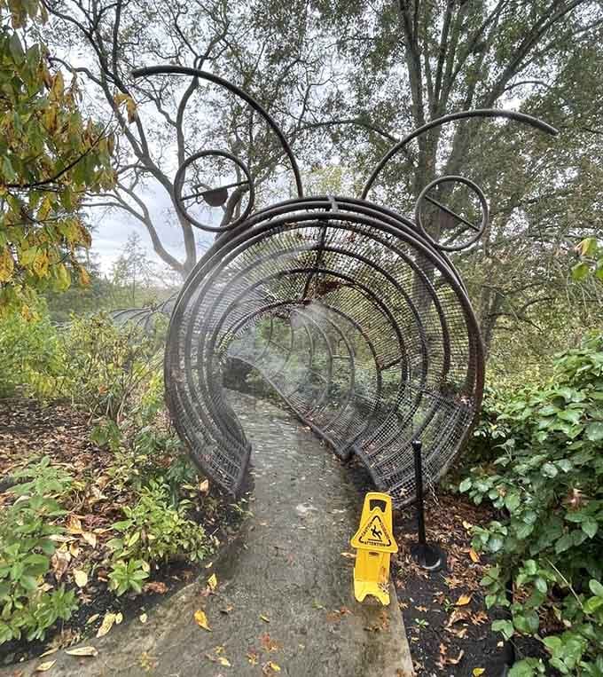 This whimsical metal tunnel creates the perfect echo chamber for kids to test their loudest dinosaur roars and superhero battle cries.