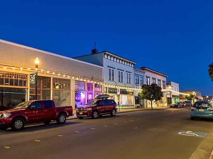 Evening light transforms Main Street into something Norman Rockwell would've painted if he'd discovered the California coast.