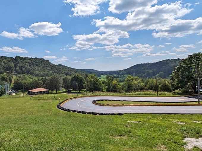The go-kart track curves through the valley like a ribbon of pure adrenaline and friendly competition.