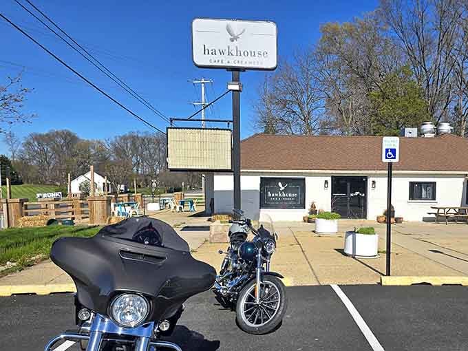 Motorcycles parked outside Hawkhouse Cafe signal good eats ahead, because bikers always know where to find the best stops.