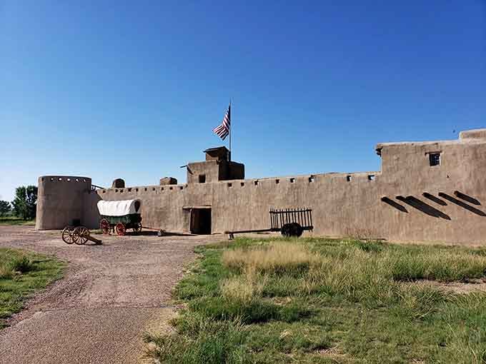 Bent's Old Fort rises from the plains like a time machine made of adobe and historical accuracy.
