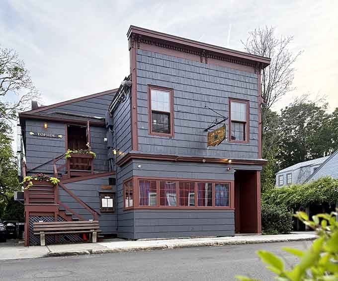 Maddie's Sail Loft perches above the water like it grew there naturally, weathered and welcoming as old friends.