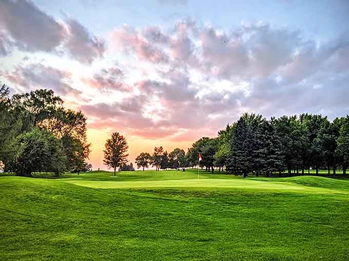 Sunset paints the golf course in colors that money can't buy, though playing here won't break you.