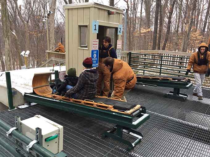 The launching platform where brave souls become human projectiles, one wooden sled at a time.