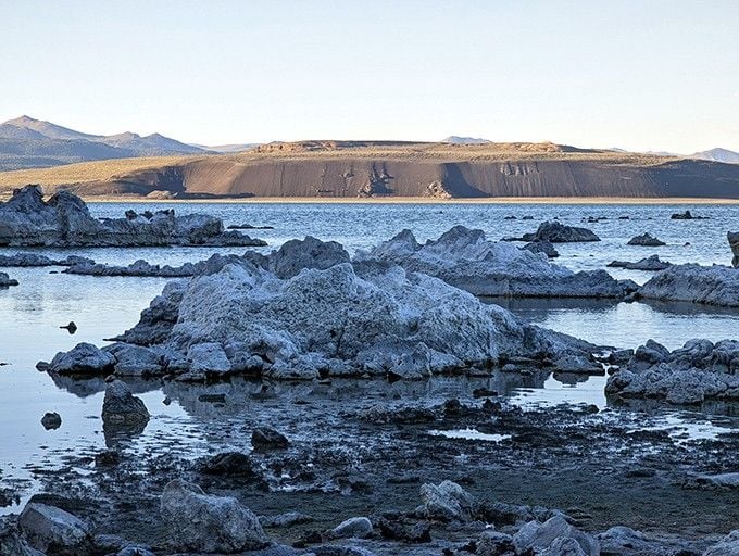 These tufa formations spent centuries growing underwater before making their dramatic debut above the surface.