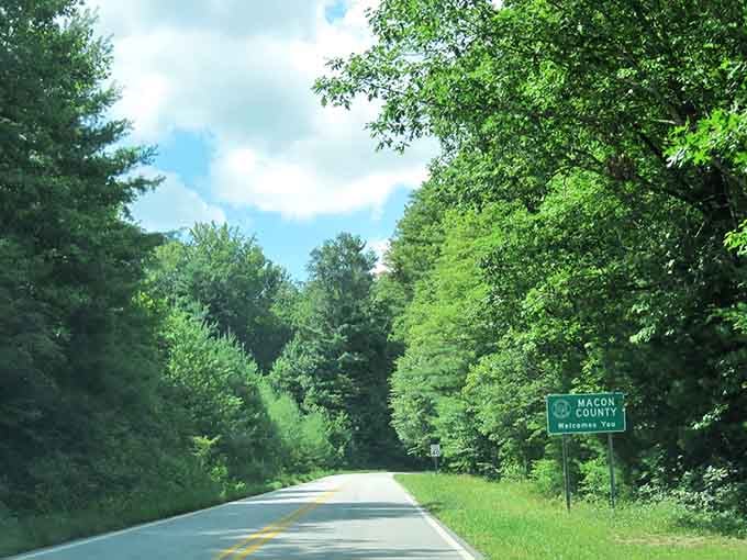 Crossing into Macon County means you're officially in the heart of moonshine country, where history runs deep as the hollers.