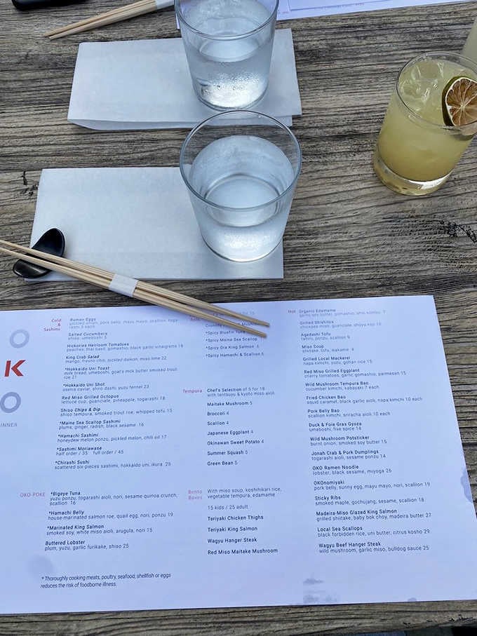 When the menu looks this good on weathered wood, you know you're in for something special beyond ordinary takeout.