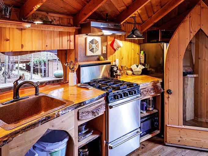 This kitchen proves that even hobbits need modern appliances, though they'd probably approve of all that gorgeous natural wood.